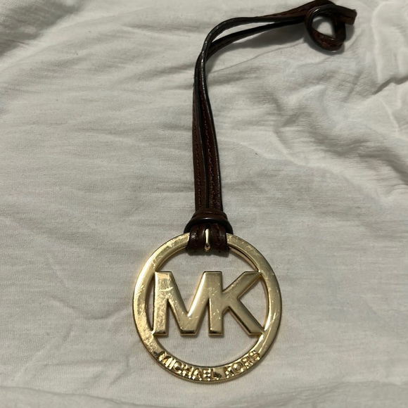 Michael Kors | Accessories | Michael Kors Hang Tag Gold With Chocolate ...